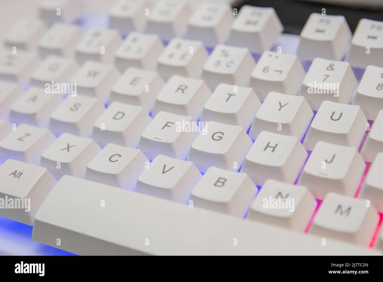 white gamer keyboard with colorful lights in rio de janeiro brazil ...