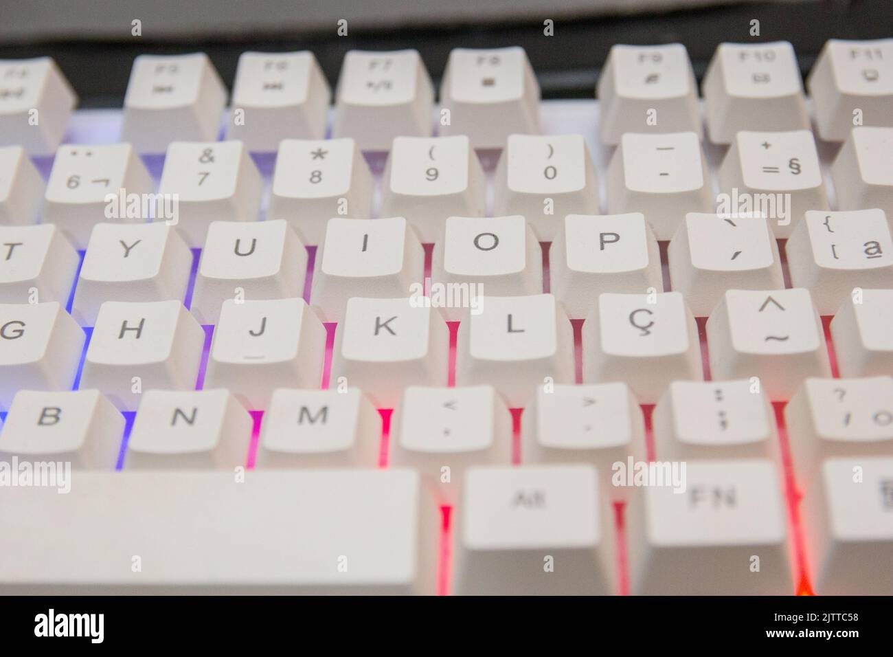 white gamer keyboard with colorful lights in rio de janeiro brazil ...