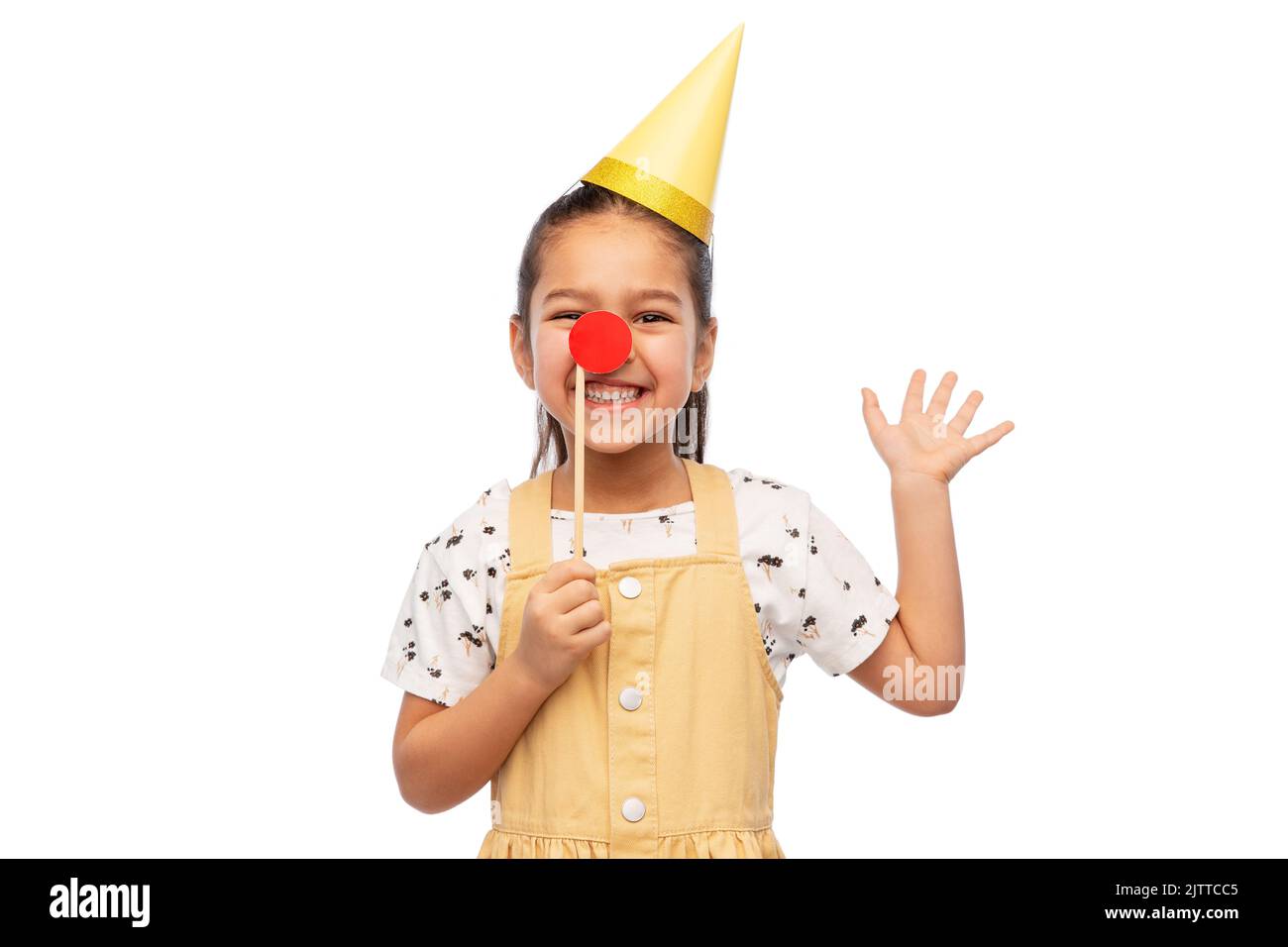 girl in birthday party hat with red clown nose Stock Photo - Alamy
