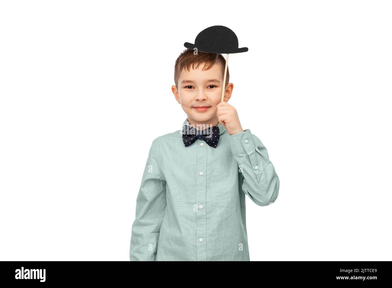 boy with birthday party props and bowler hat Stock Photo - Alamy