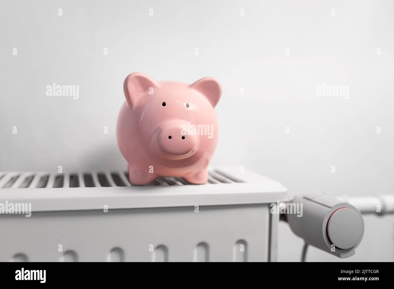 Heating radiator piggy bank hi-res stock photography and images - Alamy