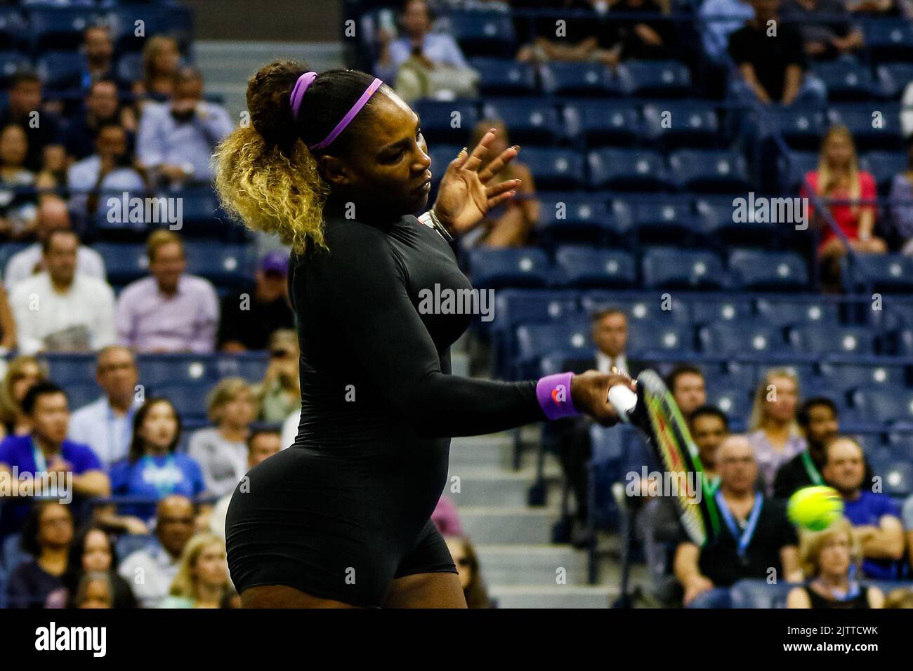 Serena Williams playing against Wang Qiang and setting her 100th US ...