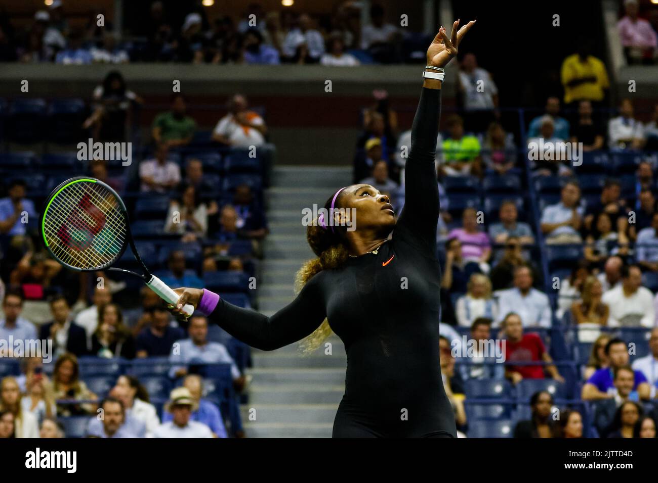 Serena Williams playing against Wang Qiang and setting her 100th US ...