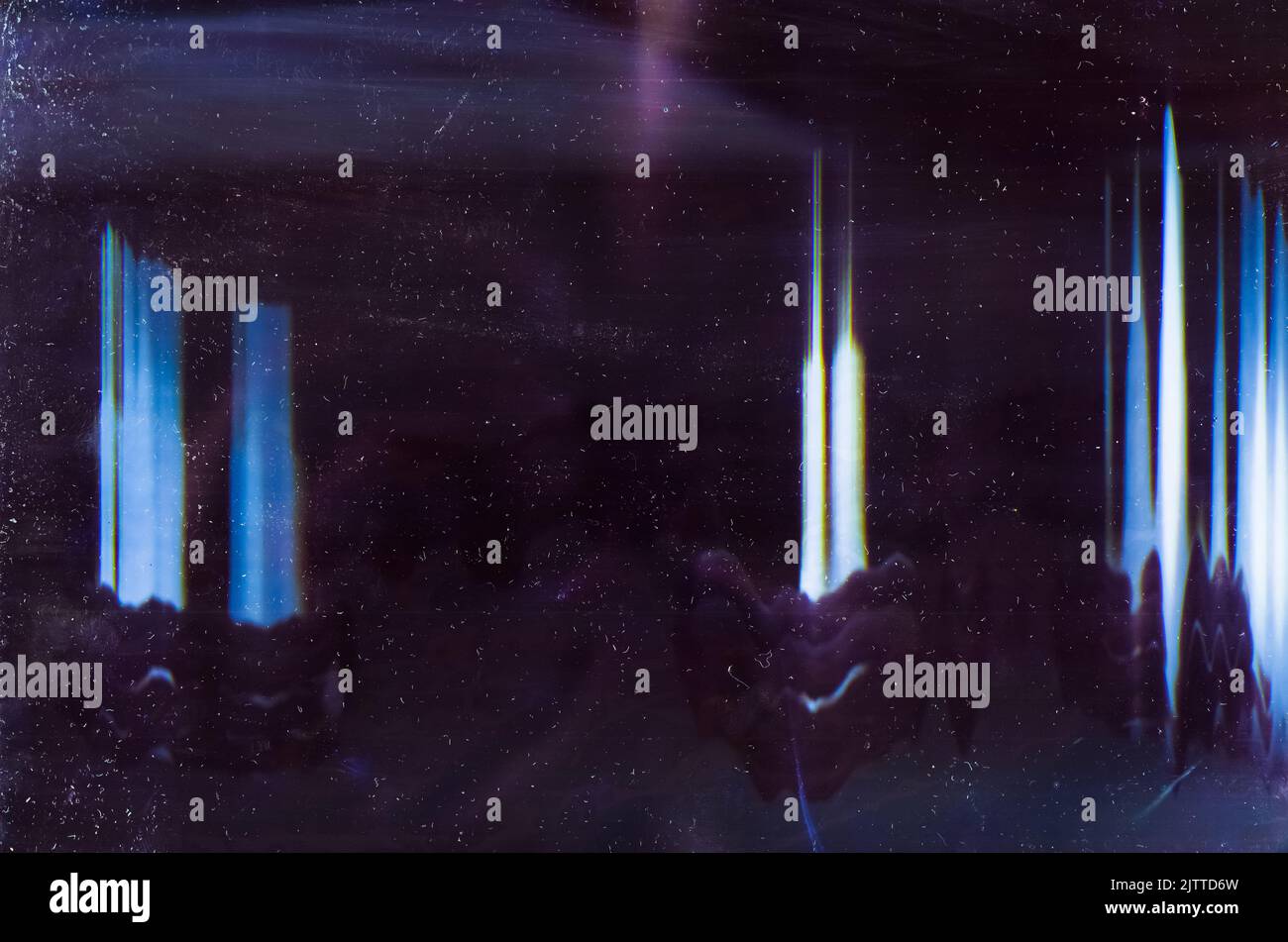 dusty overlay lens flare smeared blue gleam dark Stock Photo - Alamy