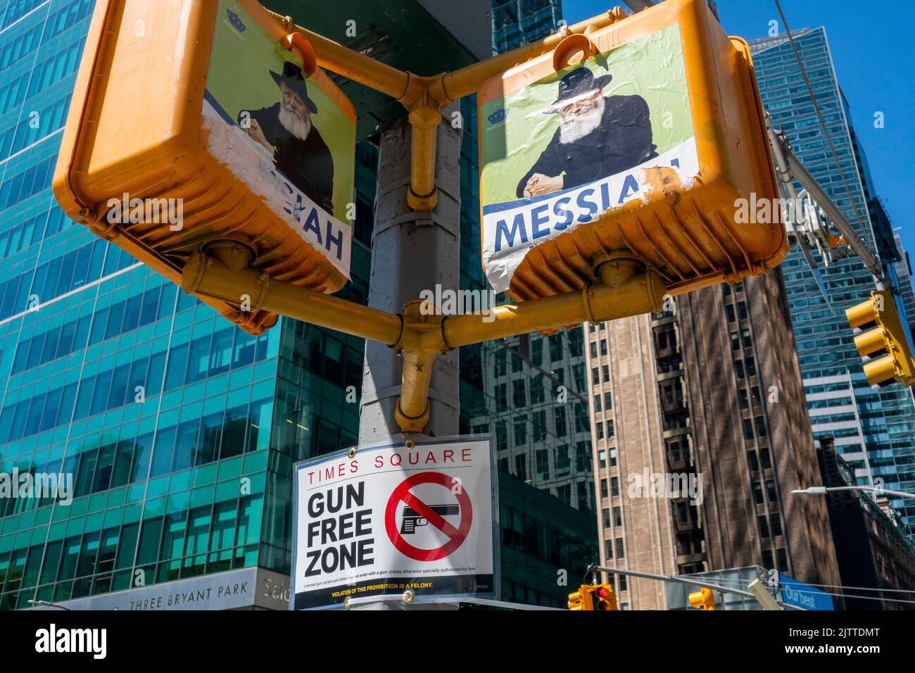 “Gun Free Zone” signs sprout in Times Square in New York on Thursday ...