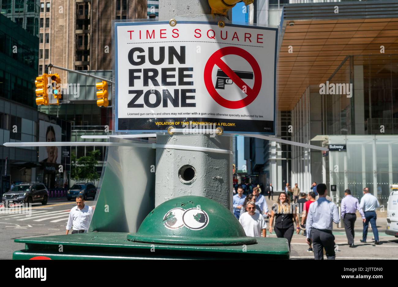 “Gun Free Zone” signs sprout in Times Square in New York on Thursday ...