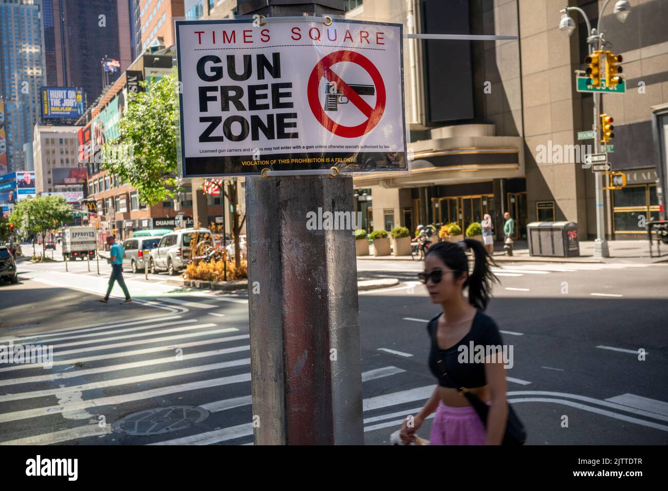 “Gun Free Zone” signs sprout in Times Square in New York on Thursday ...