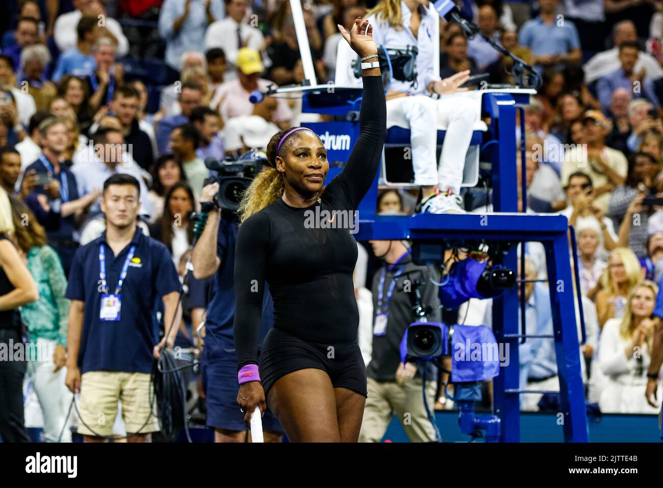 Serena Williams playing against Wang Qiang and setting her 100th US ...