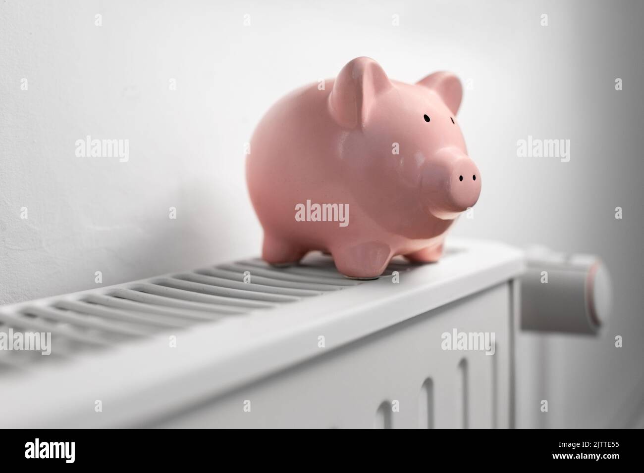Heating radiator piggy bank hi-res stock photography and images - Alamy