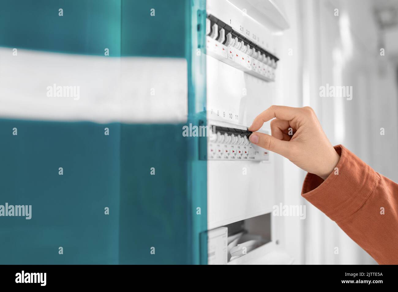 Hand switching circuit breaker hi-res stock photography and images - Alamy