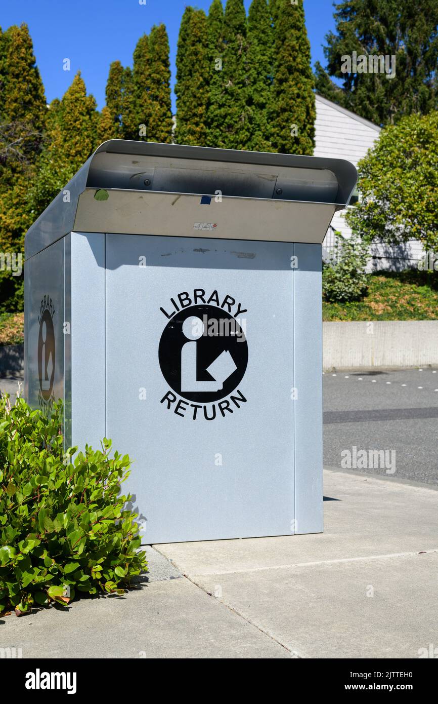 Bellingham, WA, USA - August 30, 2022; Library return box with text and ...