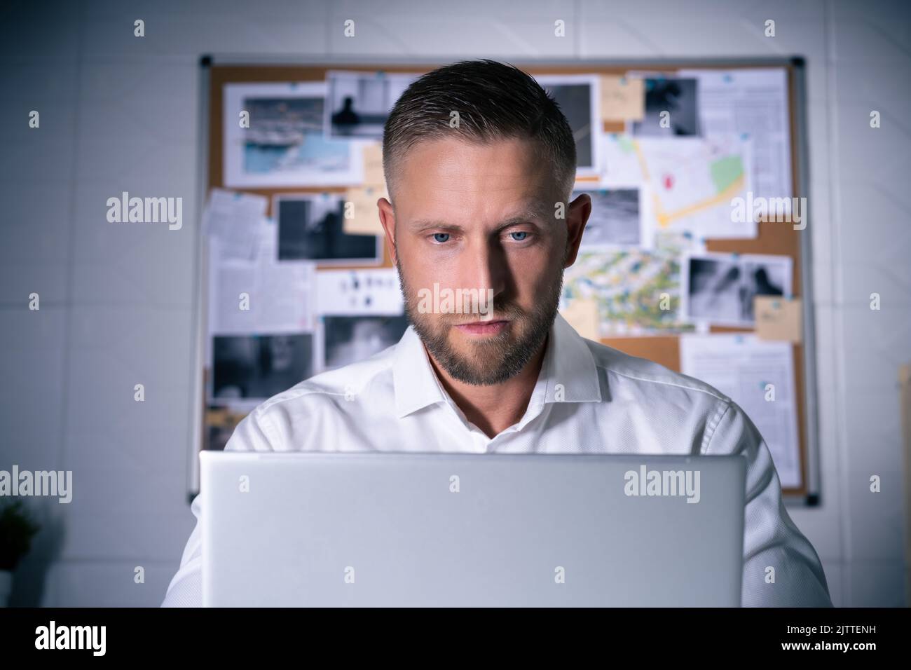 Private Detective Man Searching Online On Laptop Computer Stock Photo ...