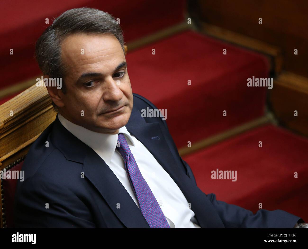 Greek Prime Minister KYRIAKOS MITSOTAKIS speaks in the Greek Parliament ...