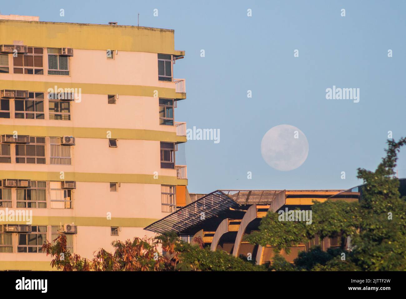 full moon over a building on Botafogo beach in Rio de Janeiro Stock ...