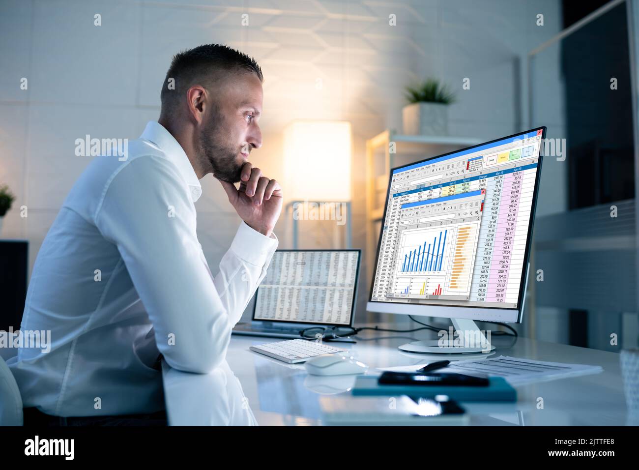 Analyst Working With Spreadsheet Business Data On Computer Stock Photo ...