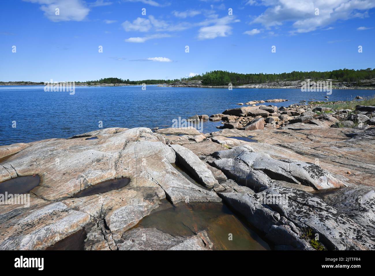 Rocky seashore. Summer landscape of the White Sea. Russia, Republic of ...