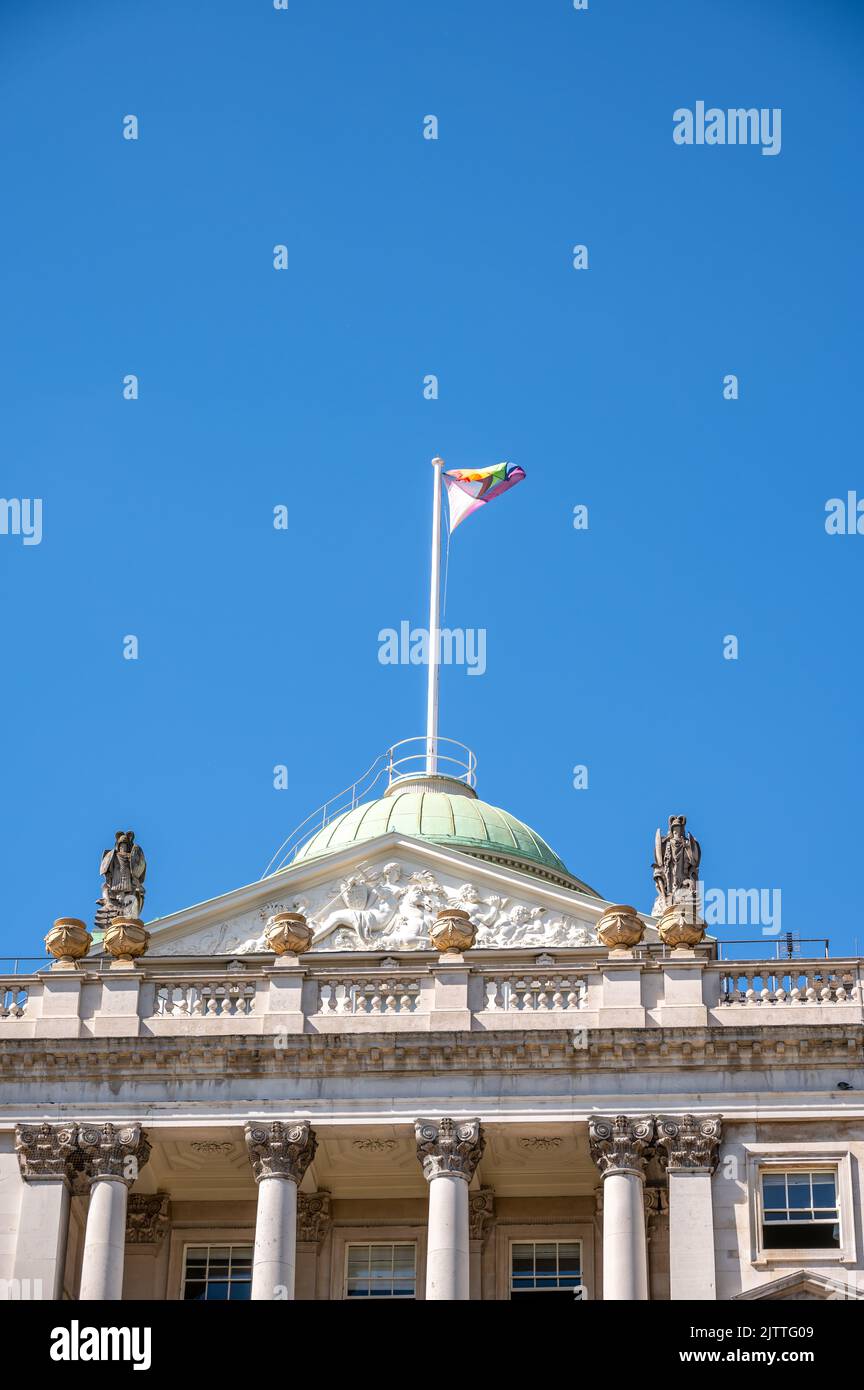 LGBTQ flag flying over the dome of a landmark building in London Stock ...