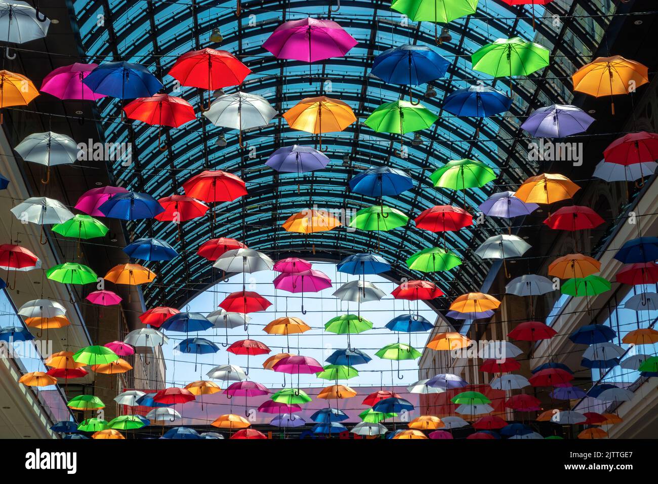 Colorful umbrellas hanging from ceiling hi-res stock photography and ...