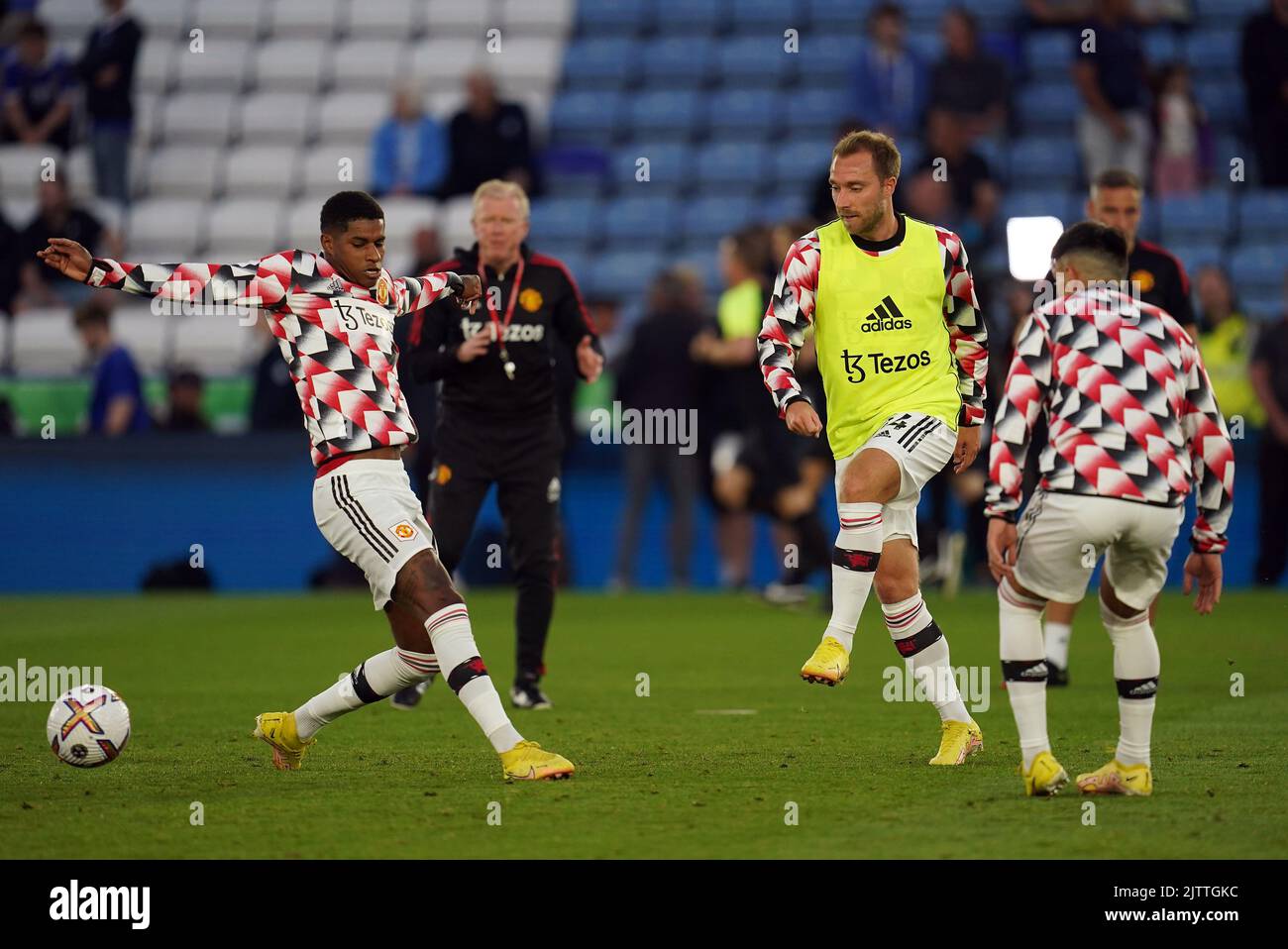 Manchester United's Christian Eriksen and Marcus Rashford (left) warm ...