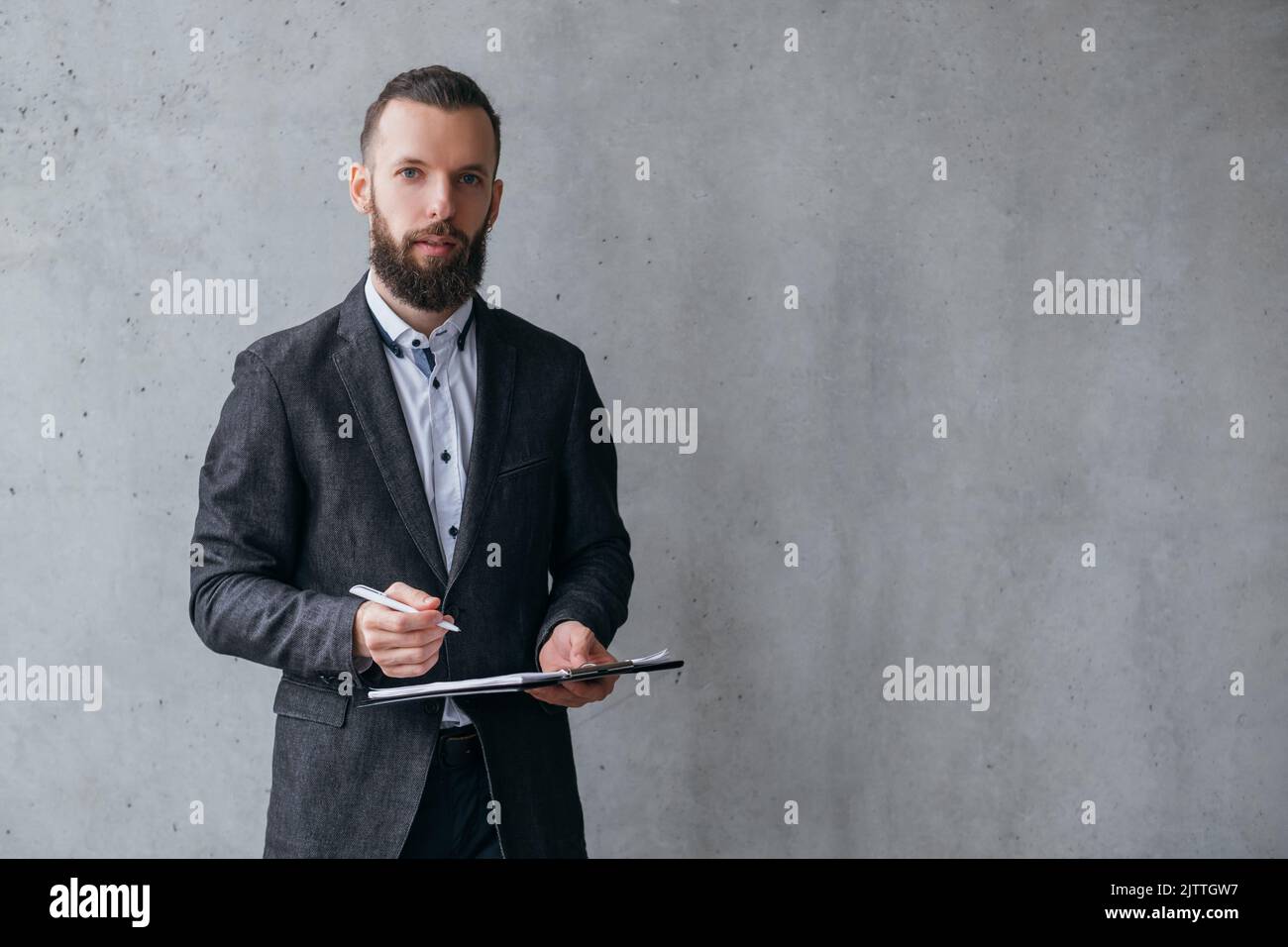 Professional man standing hi-res stock photography and images - Alamy
