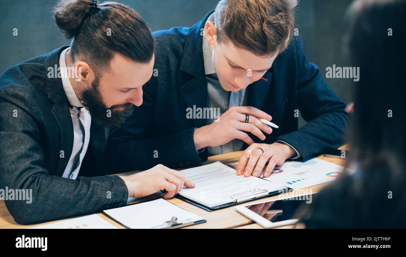 Young cooperation hi-res stock photography and images - Alamy