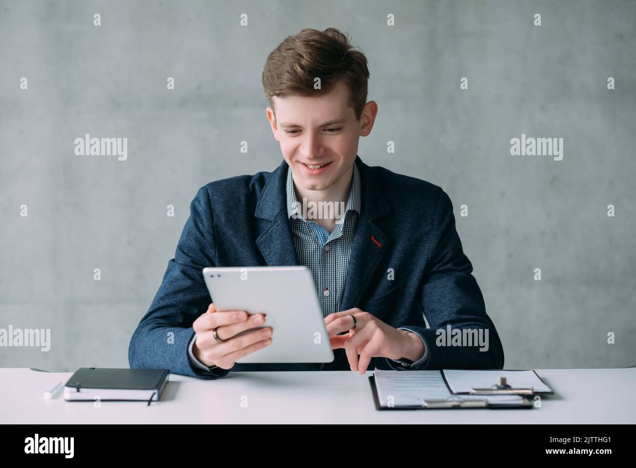 Young successful male worker hi-res stock photography and images - Alamy