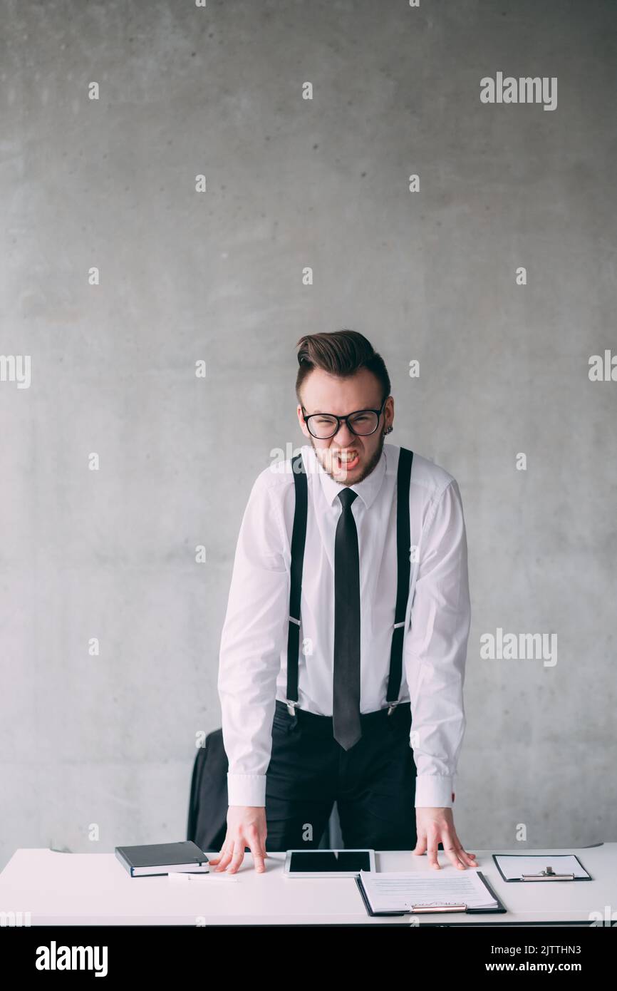 angry boss furious young business man portrait Stock Photo - Alamy