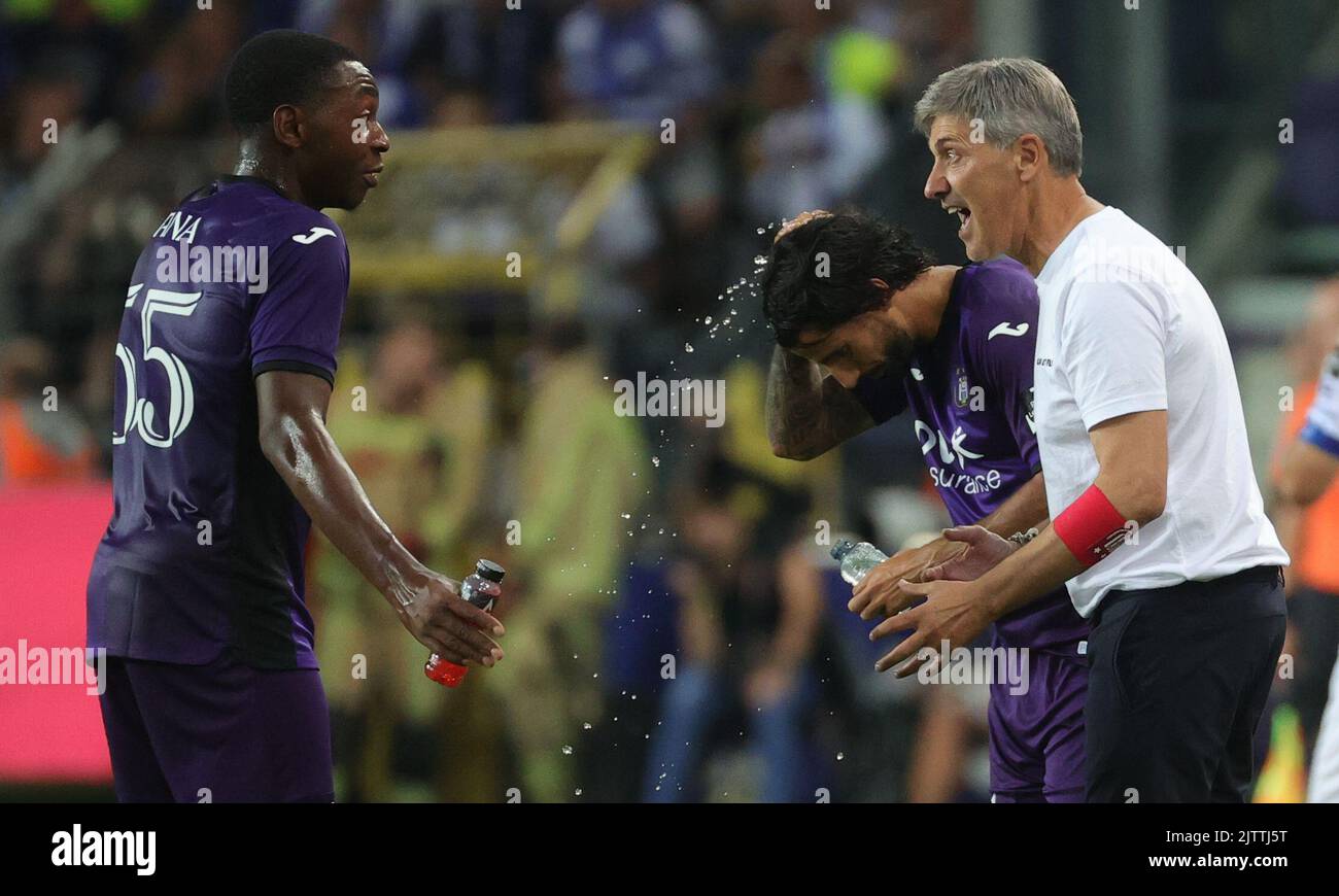 Anderlecht's Marco Kana and Anderlecht head coach Felice Mazzu pictured ...