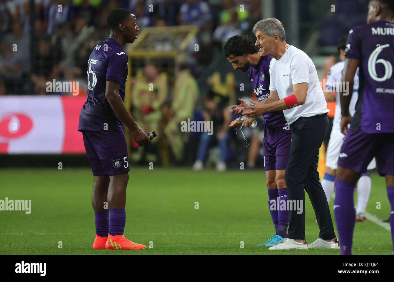 Anderlecht's Marco Kana and Anderlecht head coach Felice Mazzu pictured ...