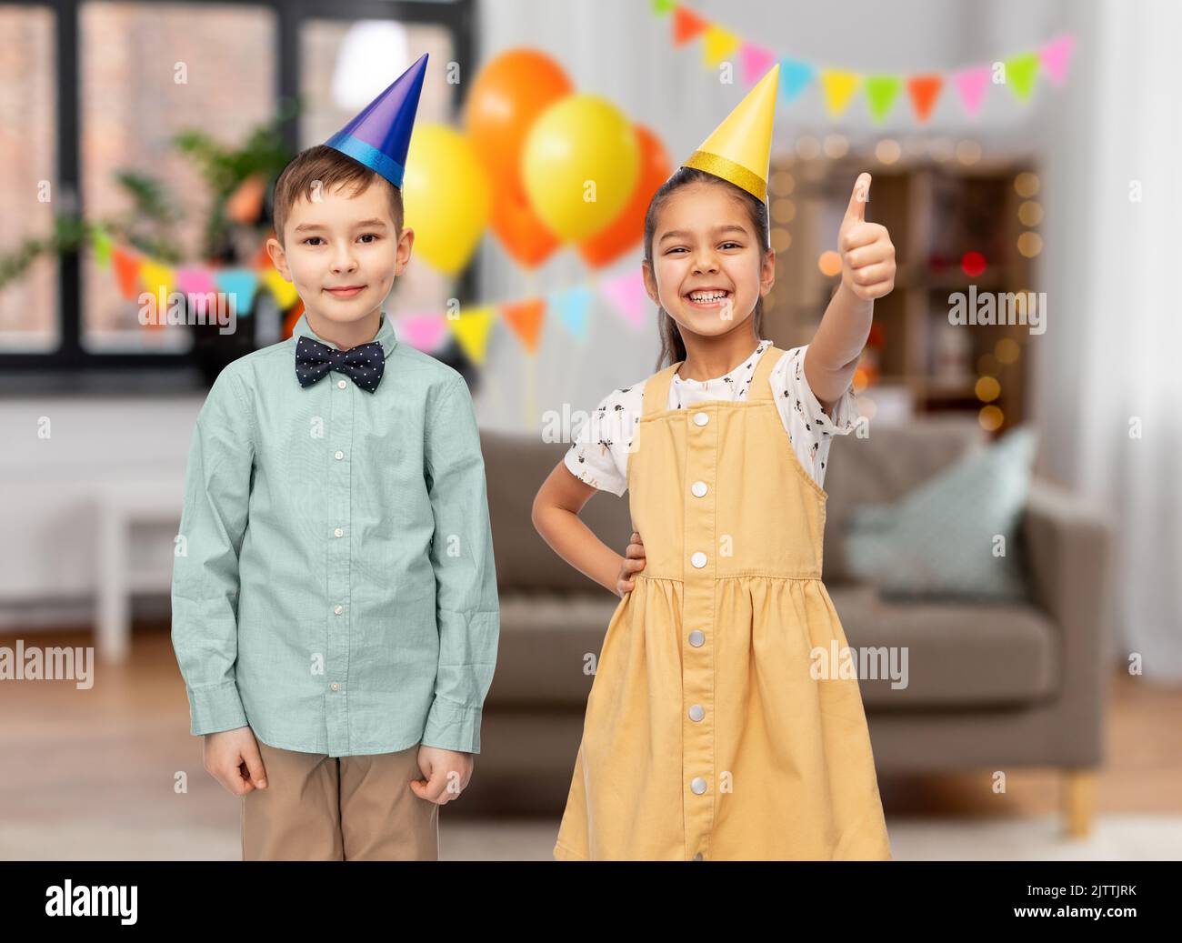 happy children showing thumbs up on birthday party Stock Photo - Alamy