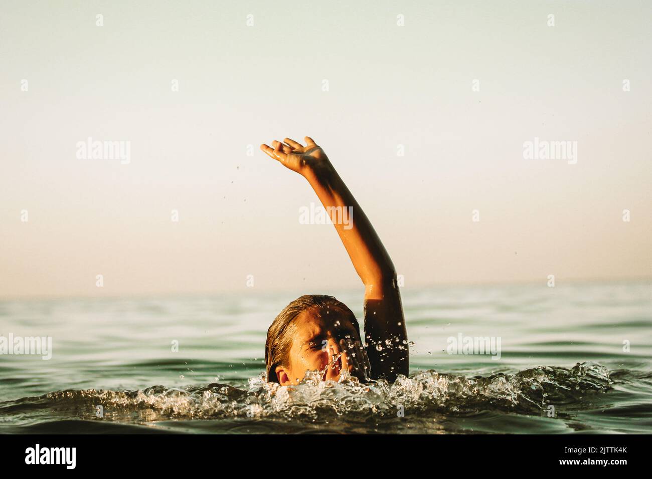 Hand above water in swim hi-res stock photography and images - Alamy