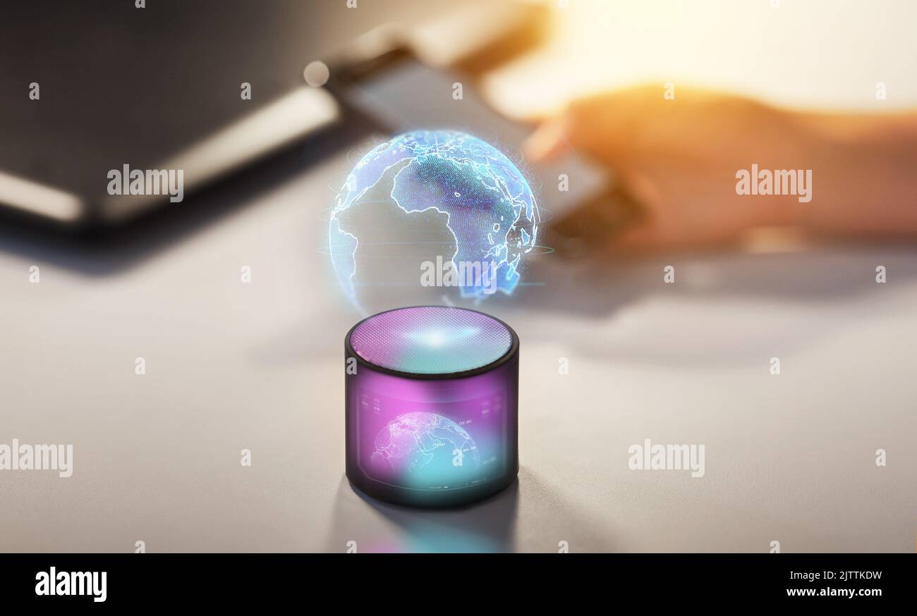 glowing smart speaker with virtual earth hologram Stock Photo - Alamy