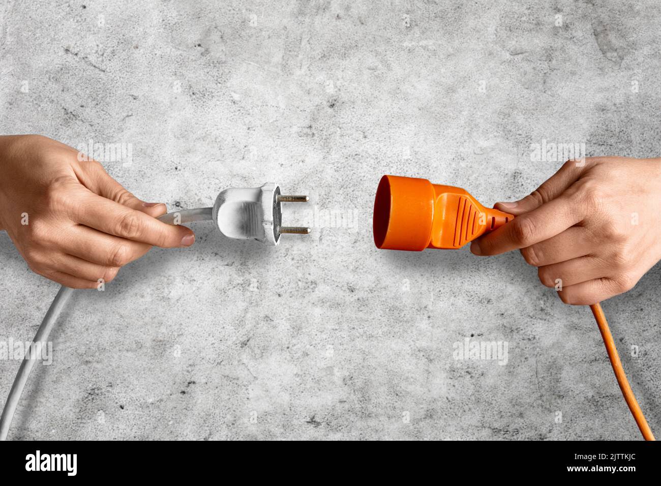 Connecting power cable to socket hi-res stock photography and images ...