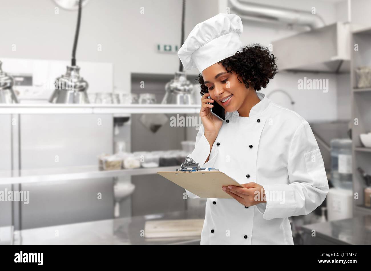 Professional chef talking on phone hi-res stock photography and images ...