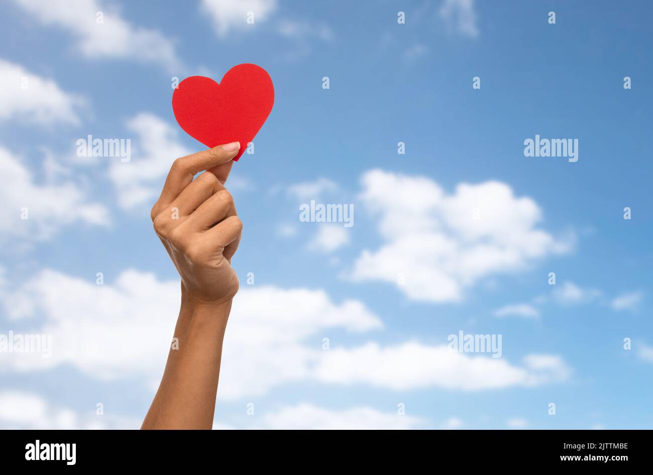 Black woman hand over heart hi-res stock photography and images - Alamy