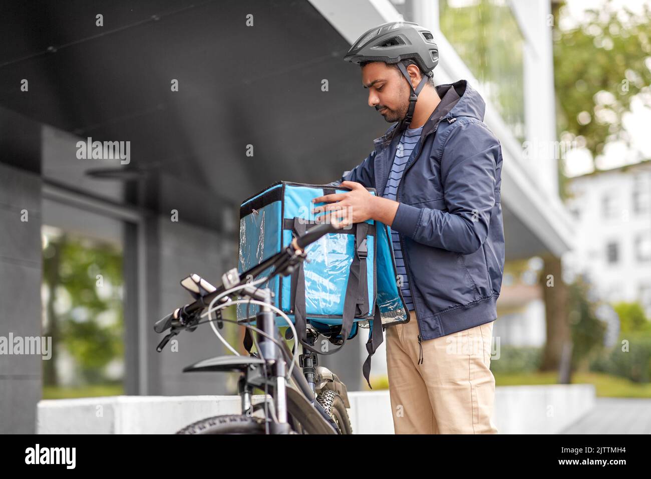 Indian bike delivery boy hi-res stock photography and images - Alamy