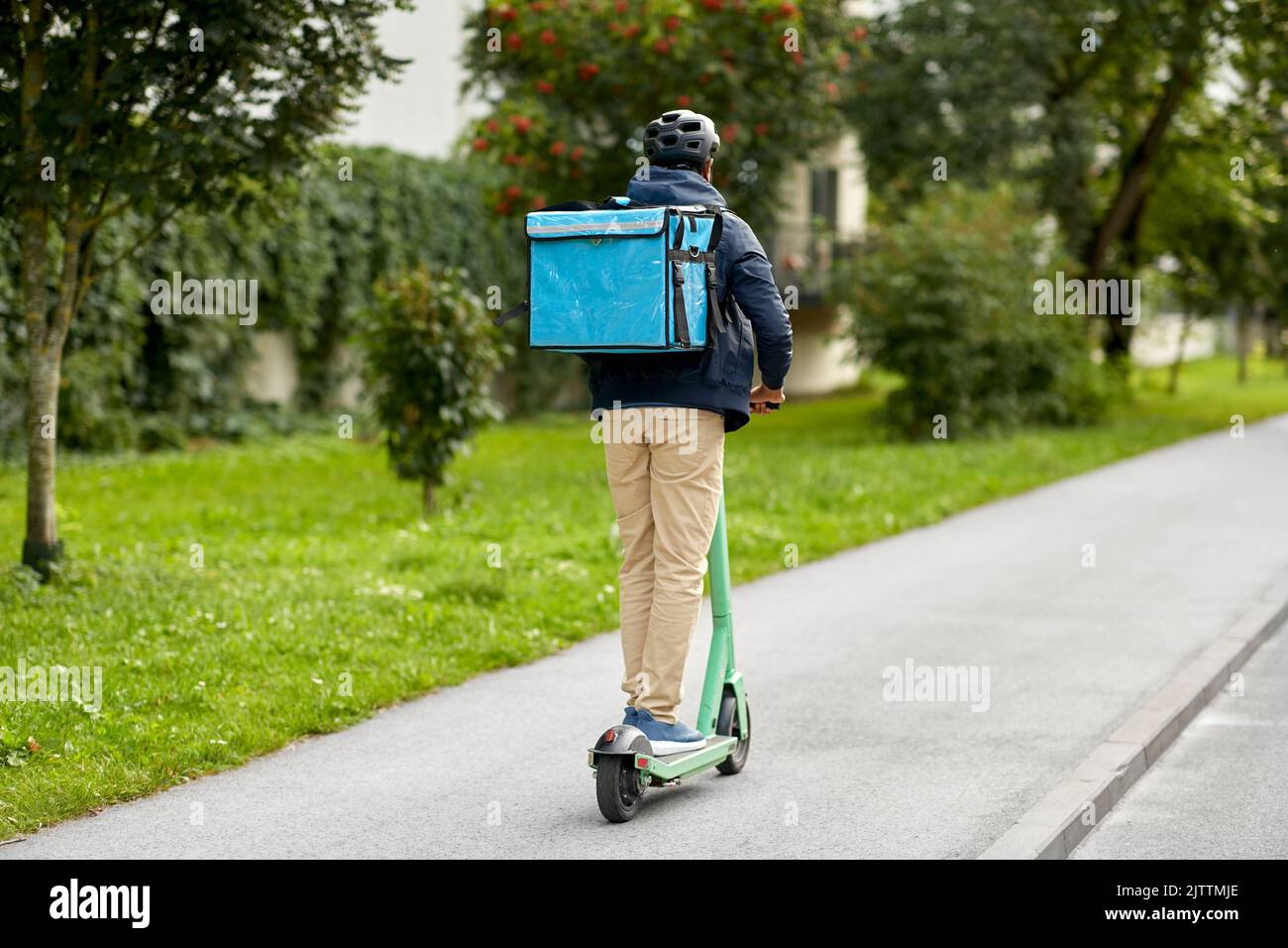 Delivery man rear view hi-res stock photography and images - Alamy