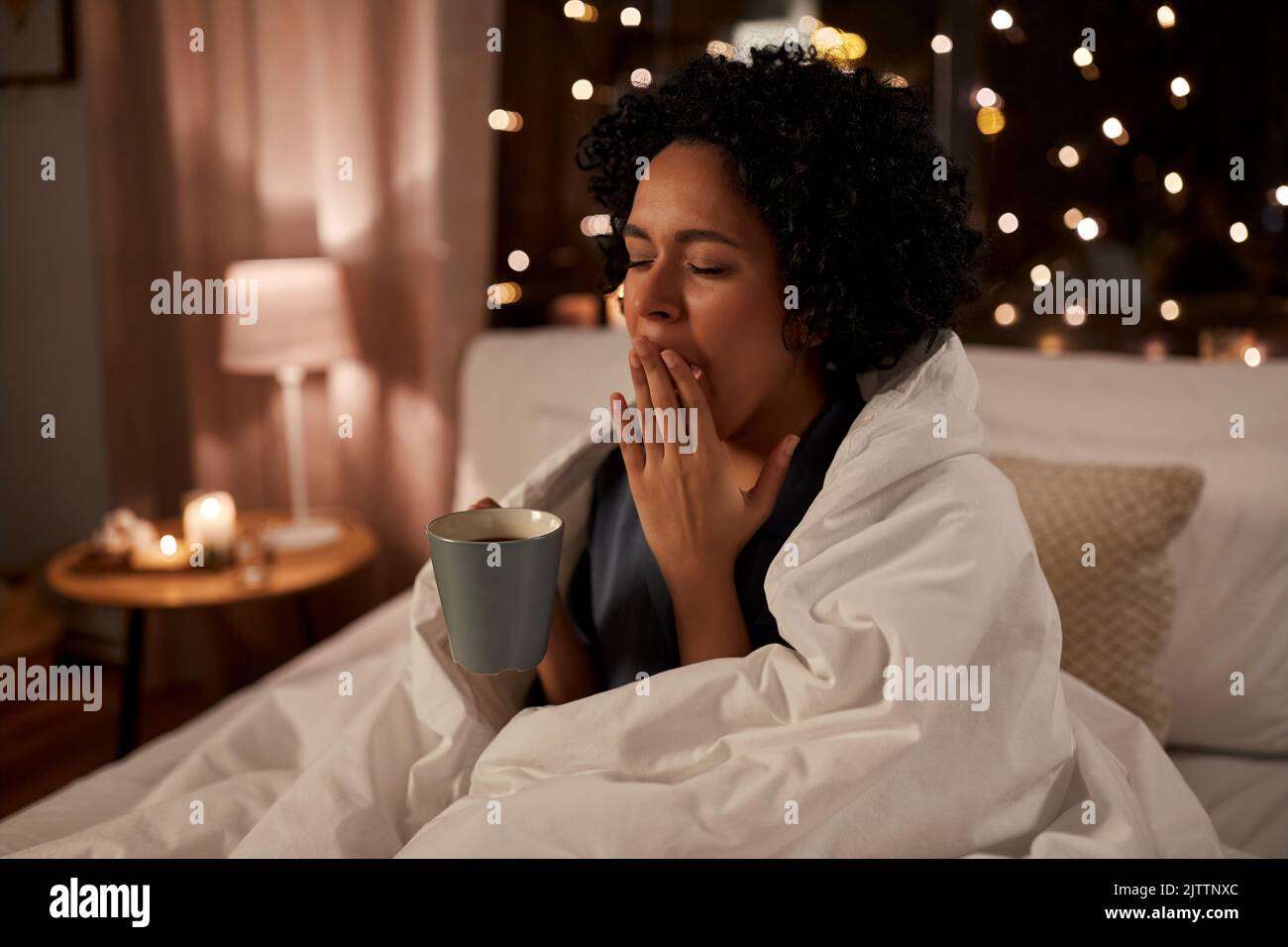 Tired woman coffee bed hi-res stock photography and images - Alamy