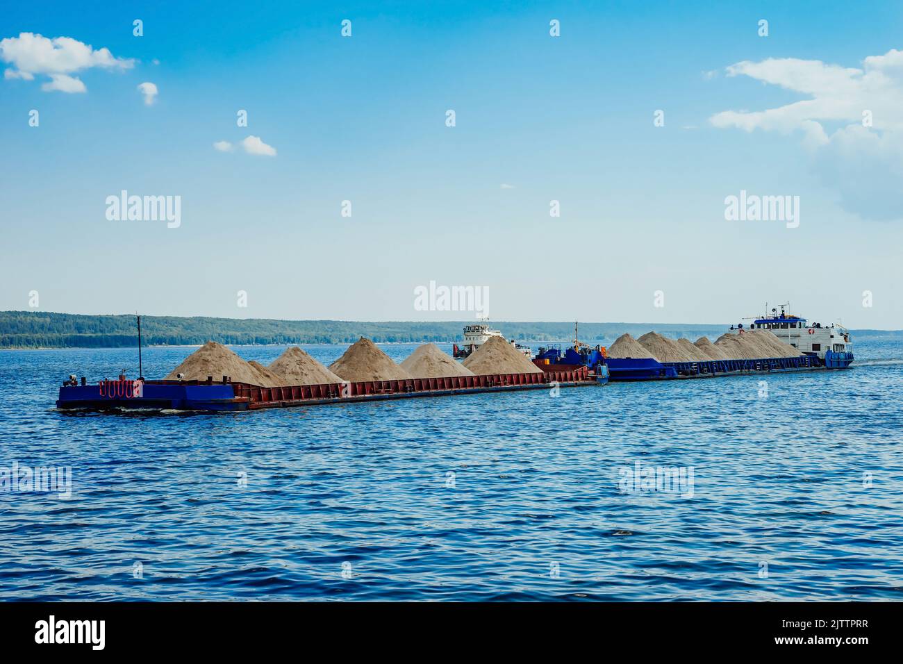 Barges with sand. The barge transports sand along the Volga river ...