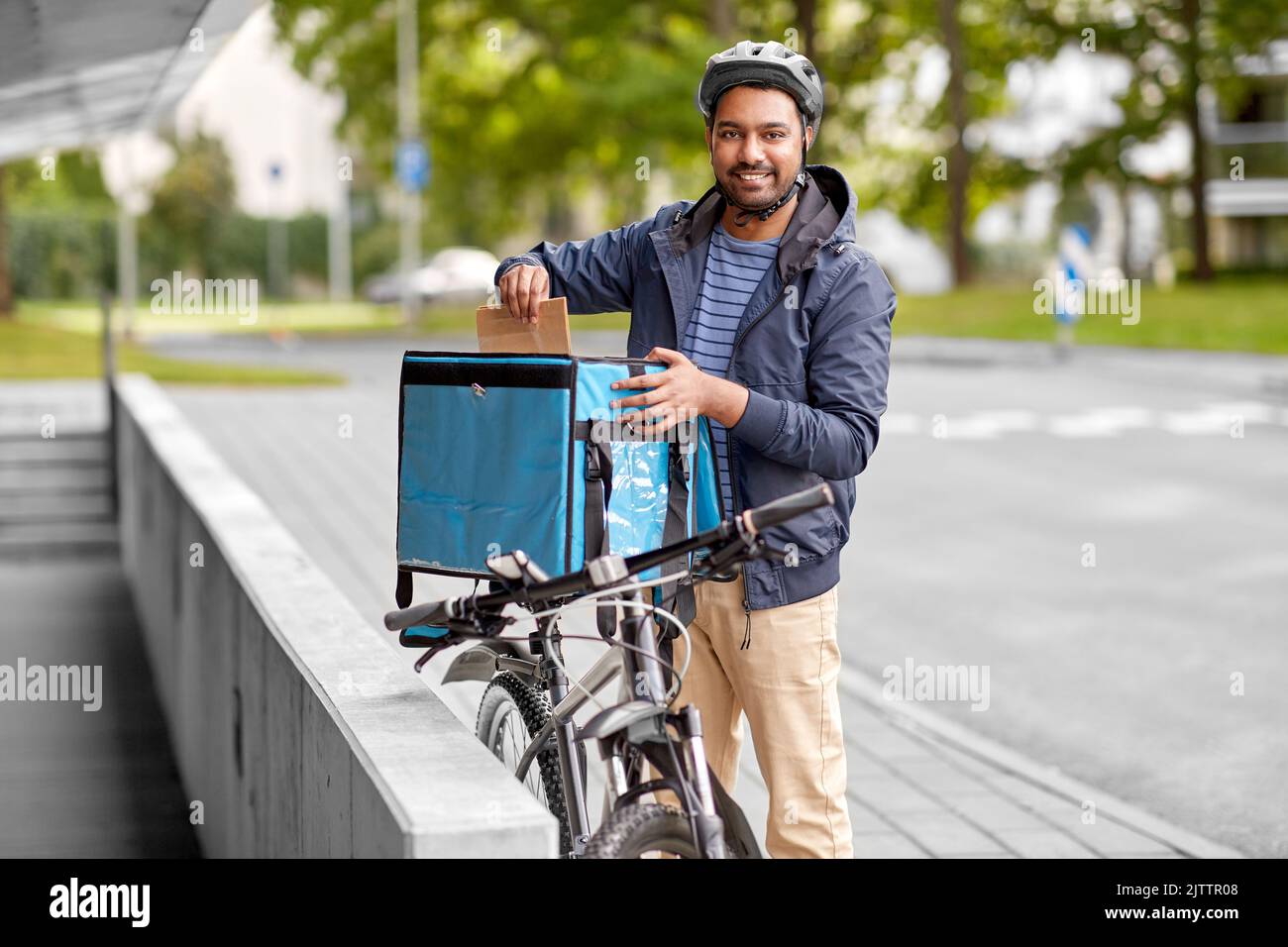 Indian bike delivery boy hi-res stock photography and images - Alamy
