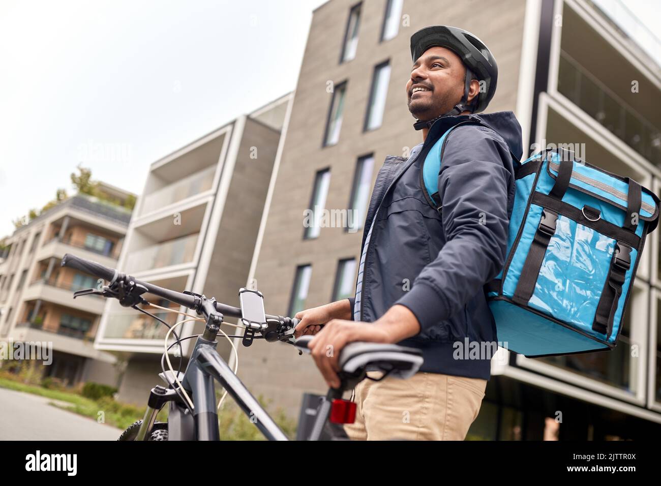 Indian bike delivery boy hi-res stock photography and images - Alamy