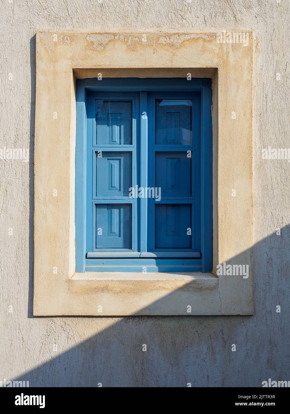 Old light blue wooden window closed with shutters Stock Photo - Alamy