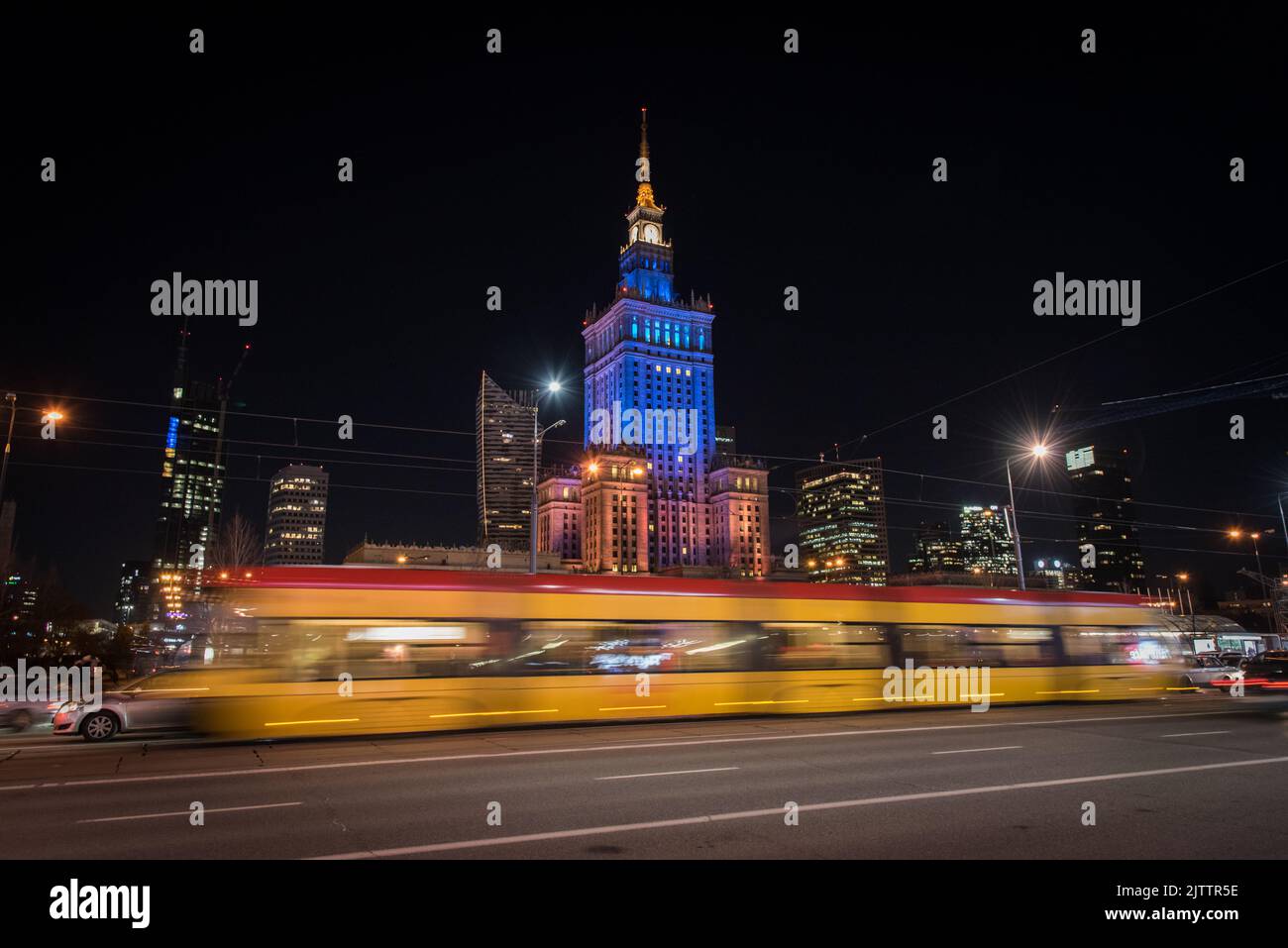 Warsaw trams by night Stock Photo - Alamy