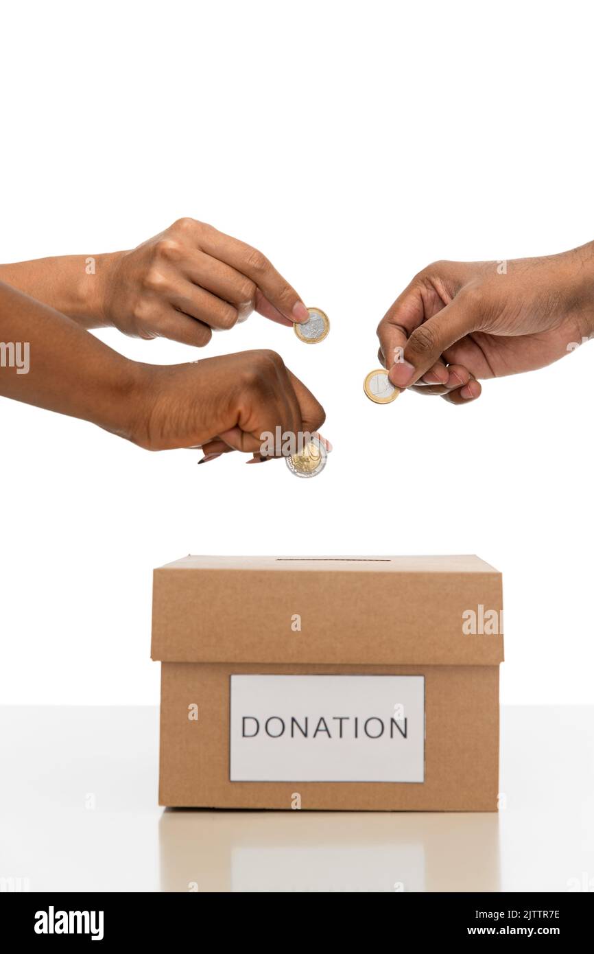 Woman holding donation coins charity hi-res stock photography and ...