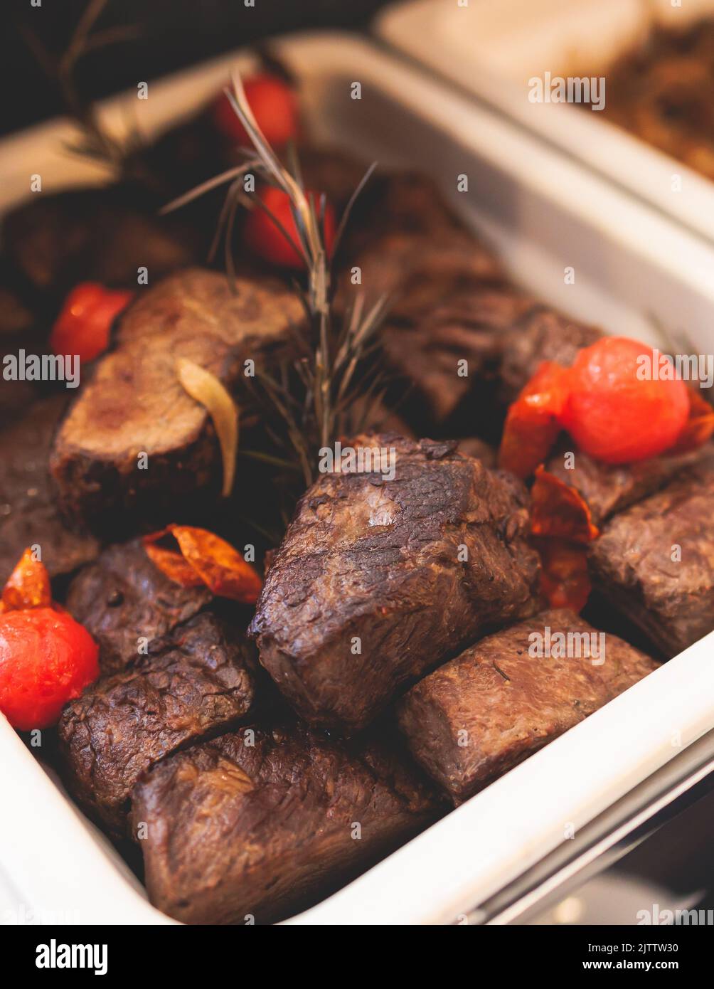 Beautifully decorated catering banquet table with different main course ...