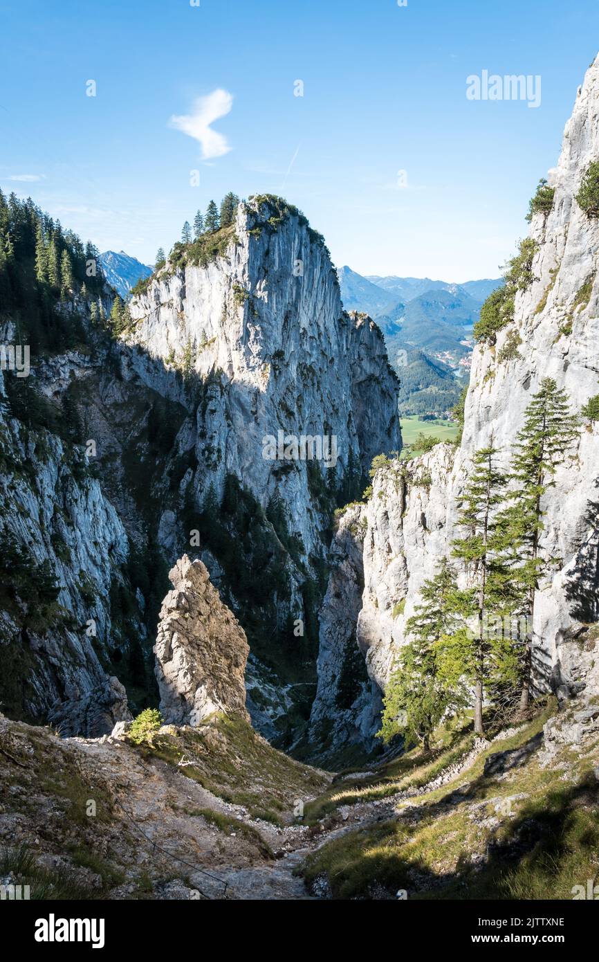 A vertical shot of tall cliffs in the countryside Stock Photo - Alamy
