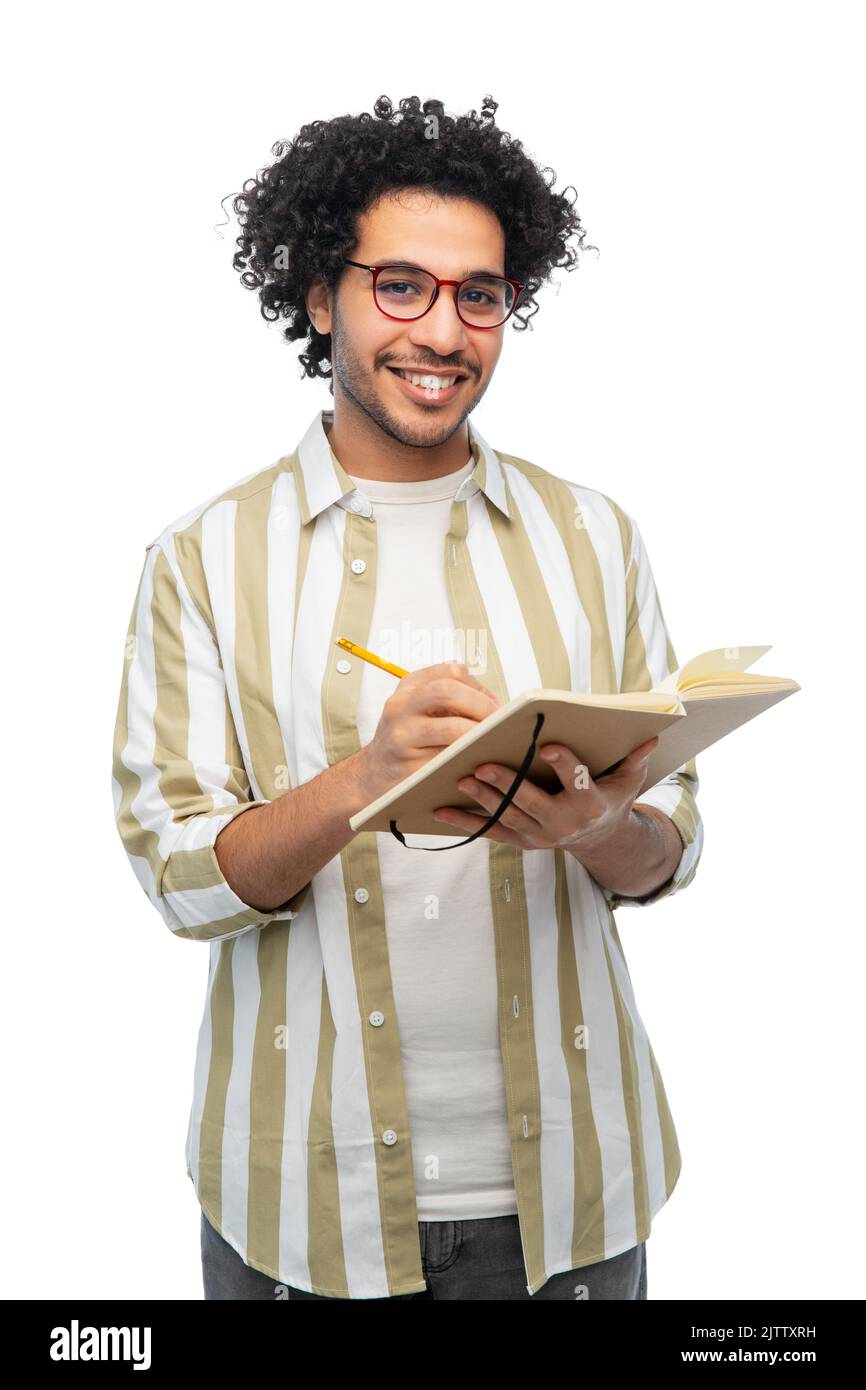 happy smiling young man with diary and pencil Stock Photo - Alamy
