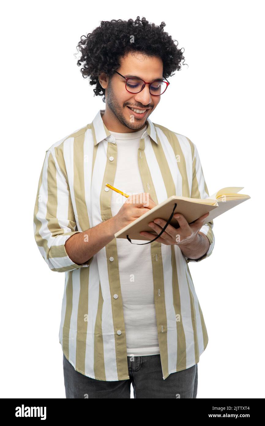 happy smiling young man with diary and pencil Stock Photo - Alamy