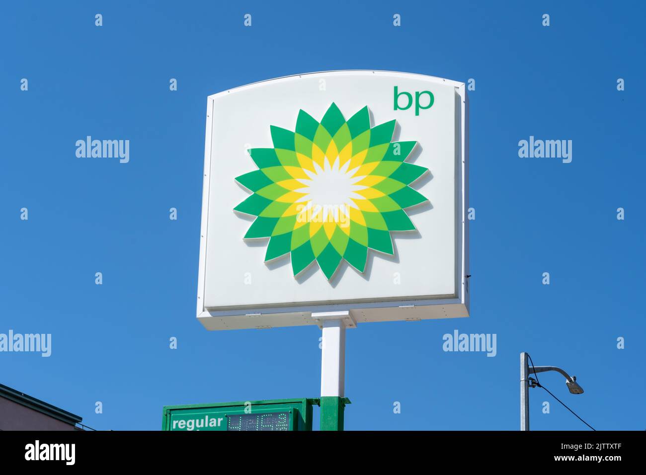 New York City, USA - August 19, 2022: A BP sign with blue sky in ...