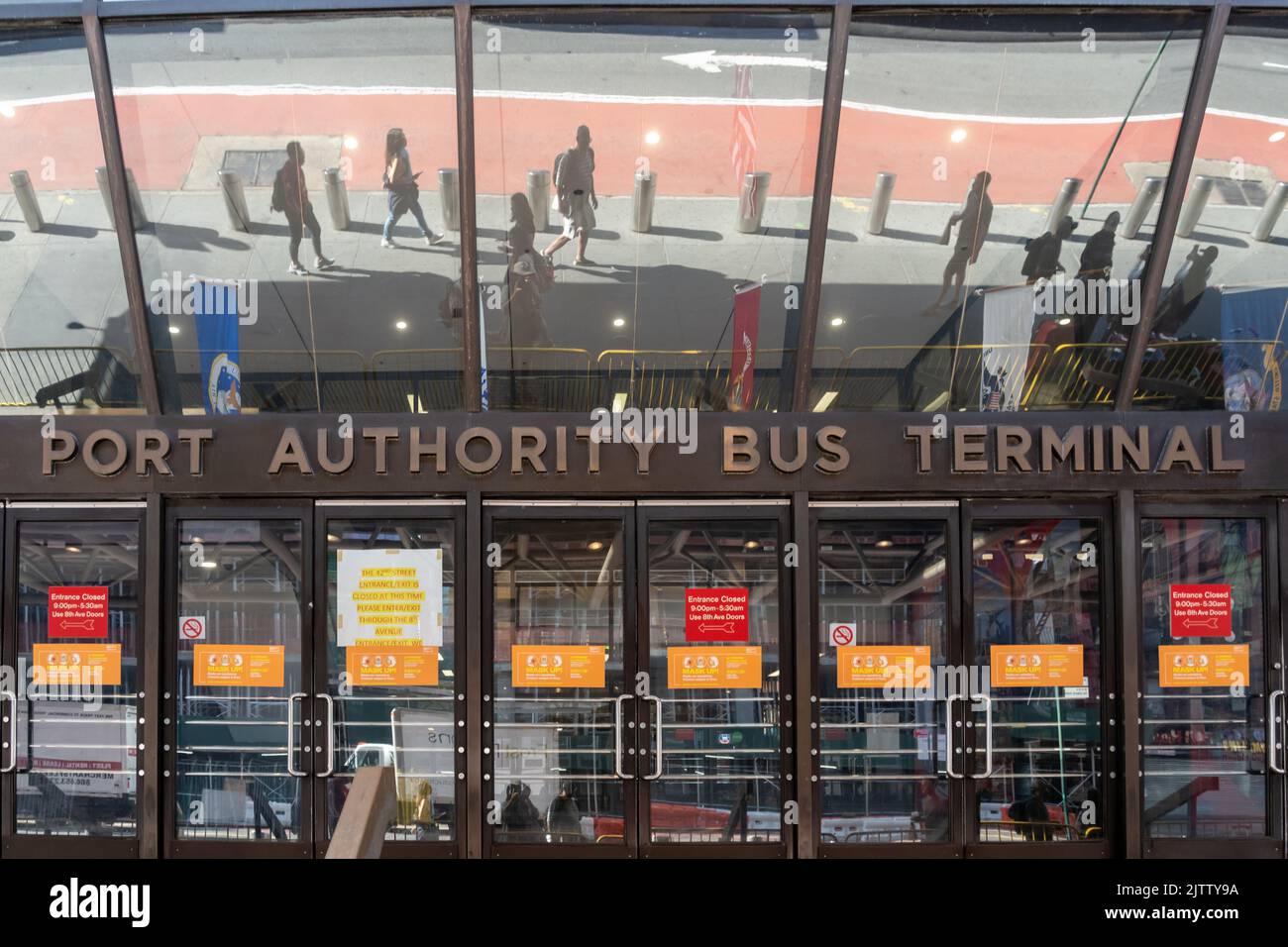 One of the entrances to Port Authority Midtown Bus Terminal in New York ...